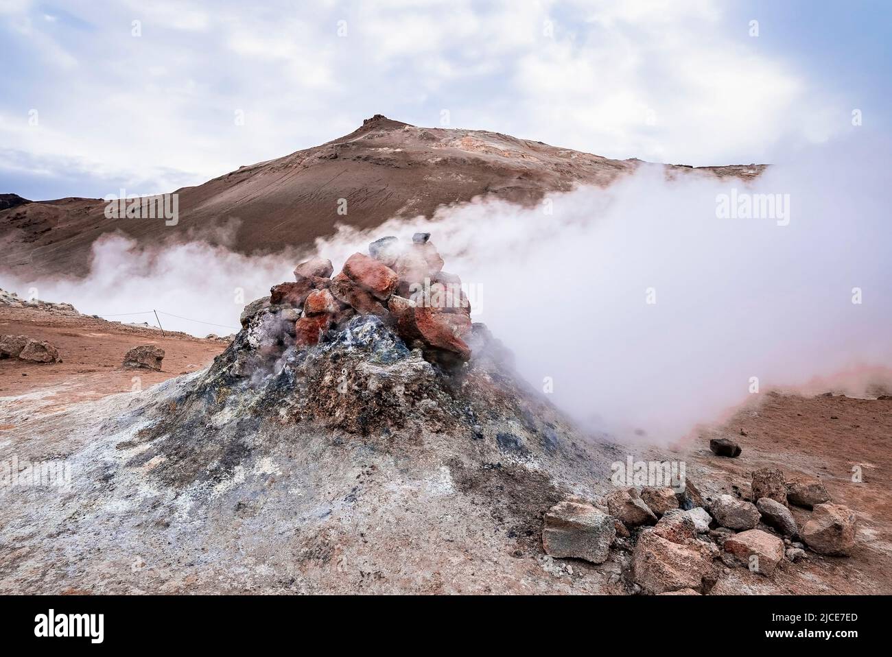 Steam emitting from fumarole in geothermal area of Hverir at Namafjall ...