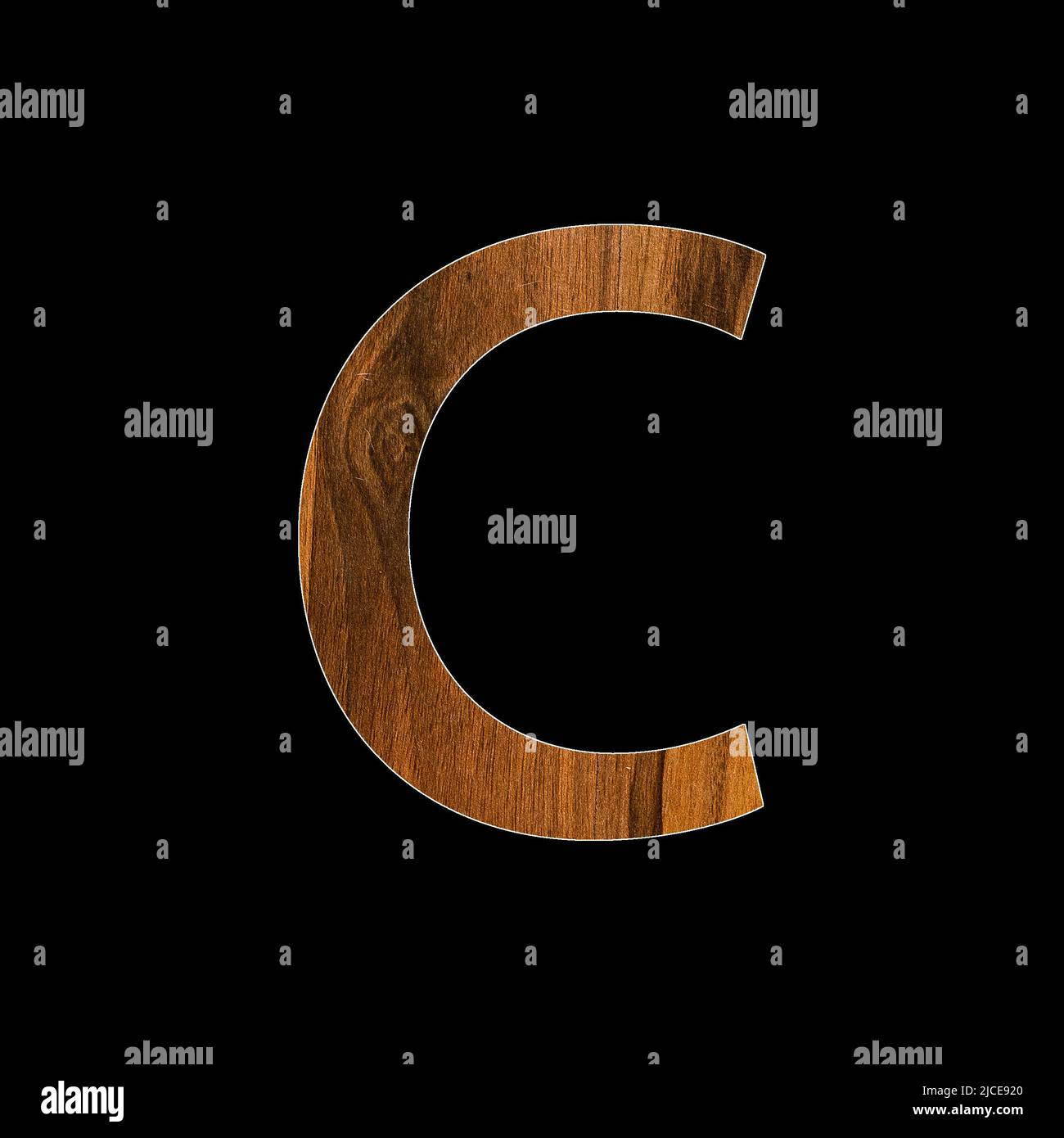 lowercase letter c - wood texture - black background Stock Photo - Alamy