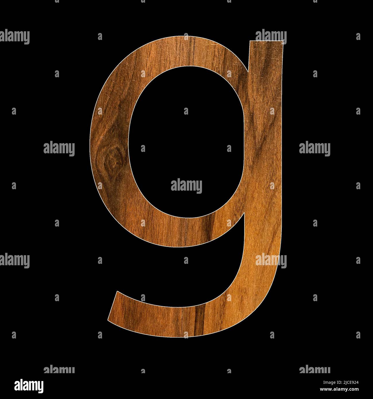 lowercase letter g - wood texture - black background Stock Photo - Alamy