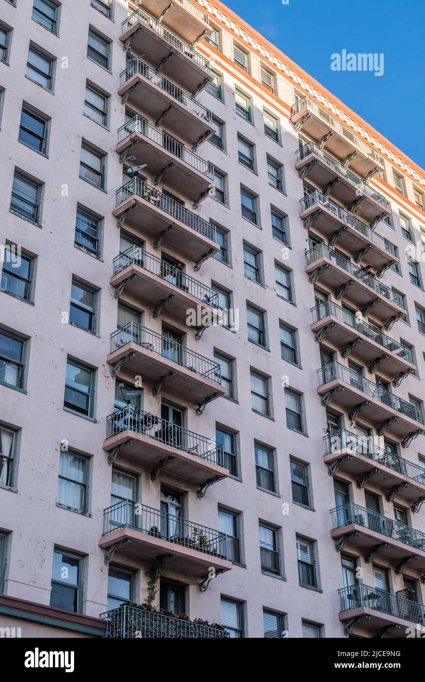 Balconies on Pink Condo Building Stock Photo - Alamy