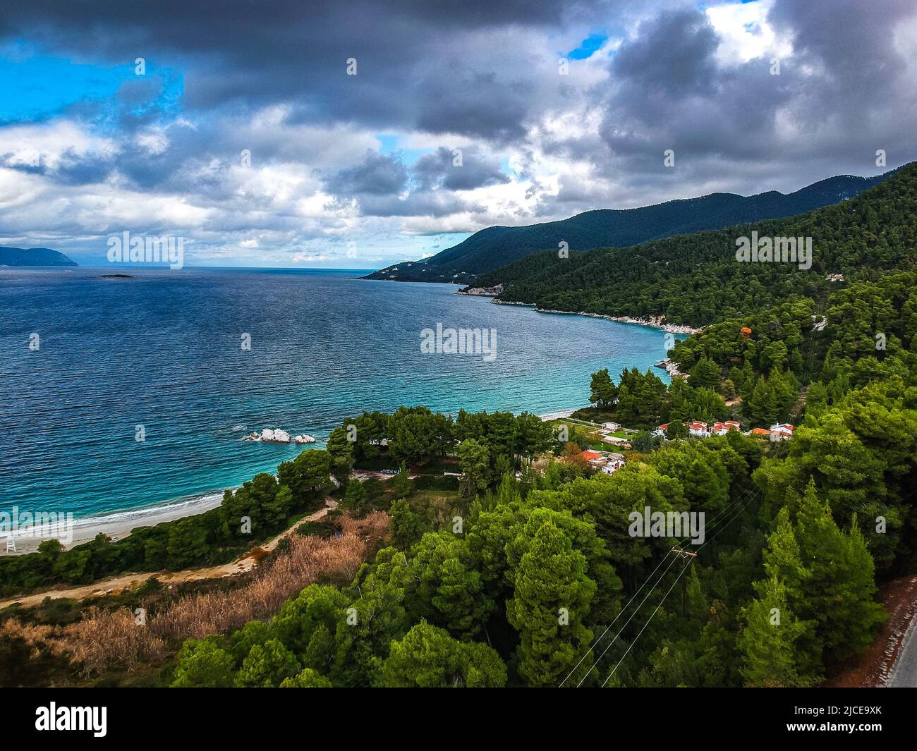 Aerial panoramic view over Milia beach in Skopelos island, against a ...