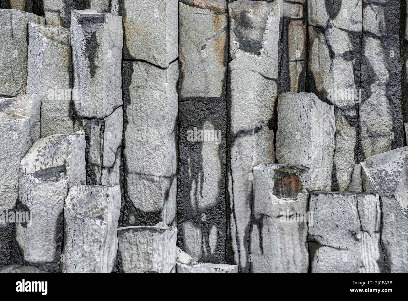 Full frame shot of basalt column rock formations at famous Reynisfjara ...