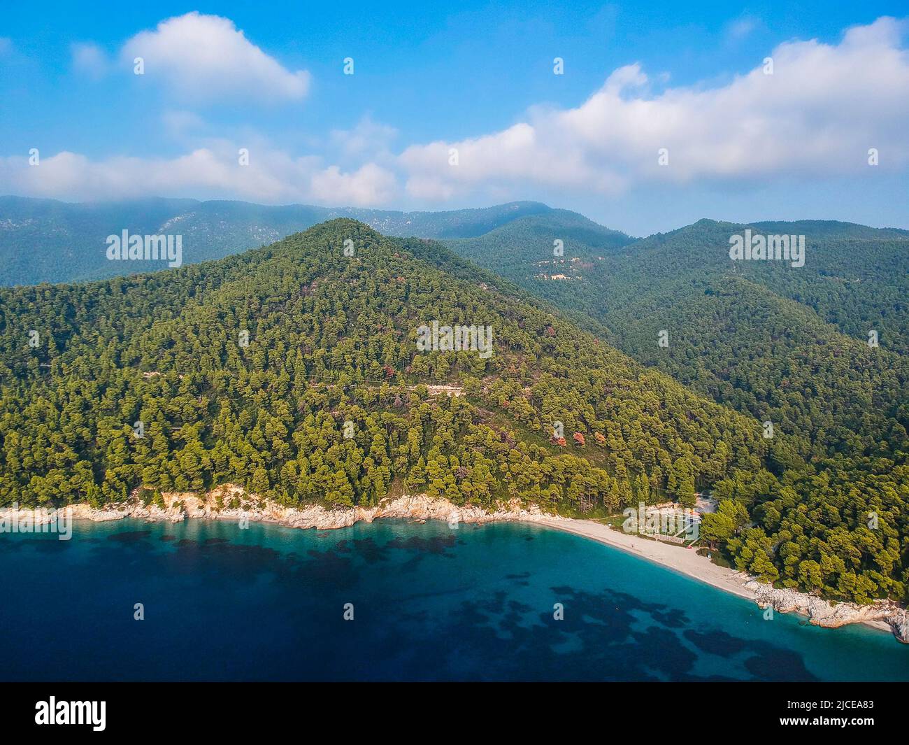 Aerial panoramic view over Milia beach in Skopelos island, against a ...