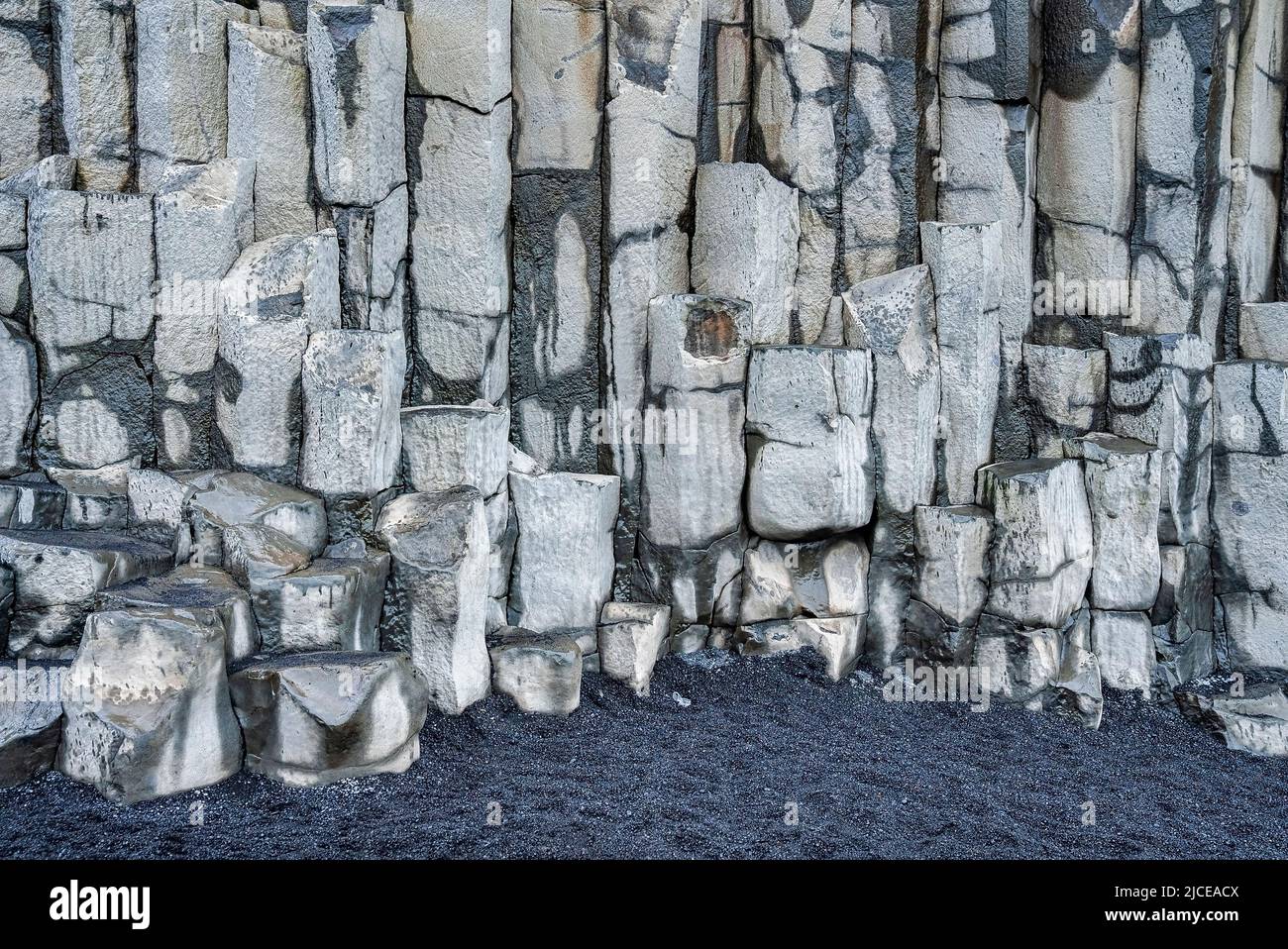 Beautiful view of basalt rock columns formation on seashore of ...