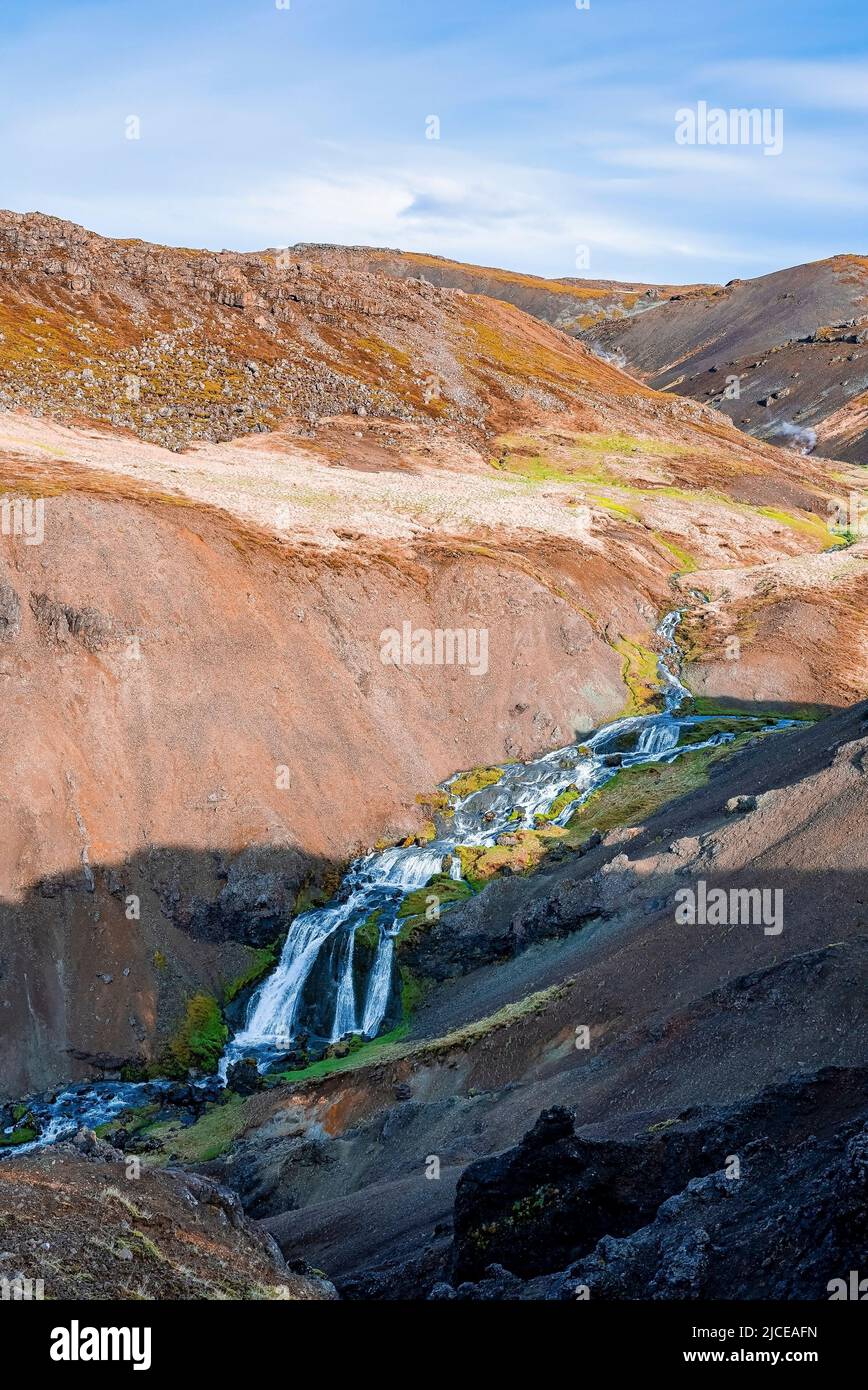 Beautiful view of hot streams amidst landscape in Hveragerdi valley ...