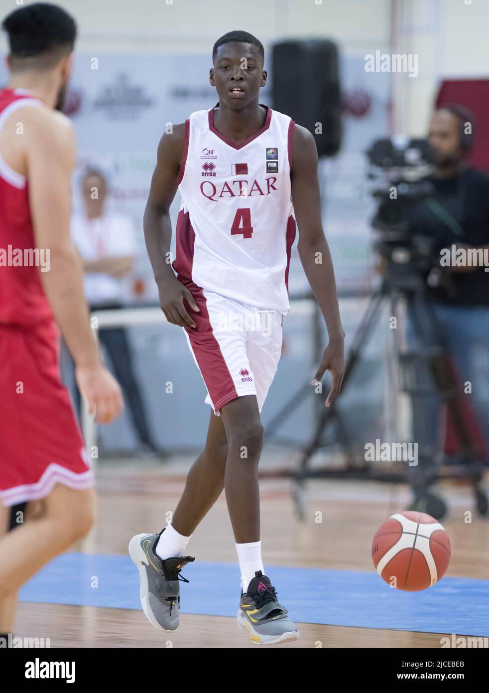 Doha, Qatar. 12th June, 2022. Mohamed Massamba Ndao of Qatar Basketball team in action during ...