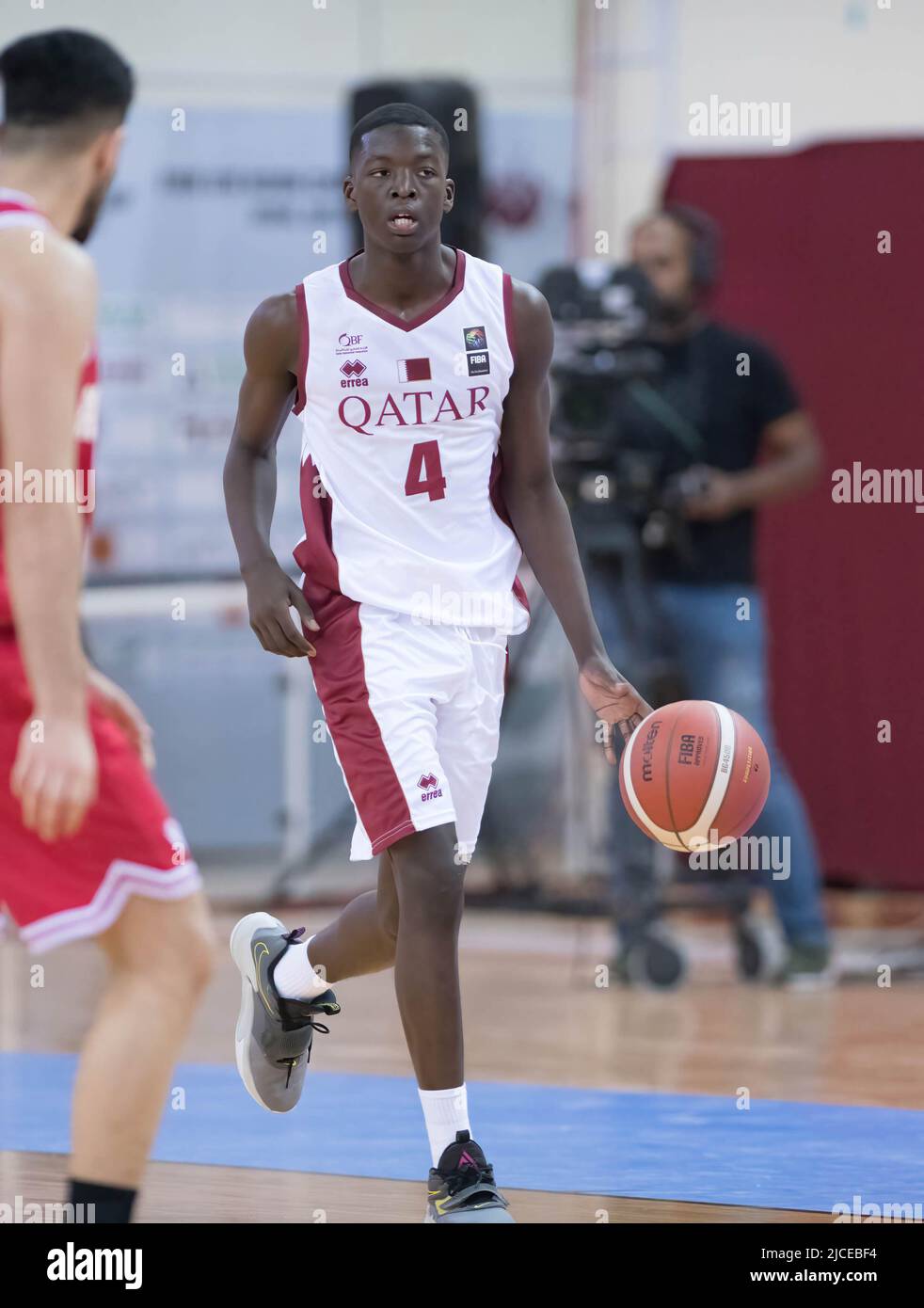 Doha, Qatar. 12th June, 2022. Mohamed Massamba Ndao of Qatar Basketball team in action during ...