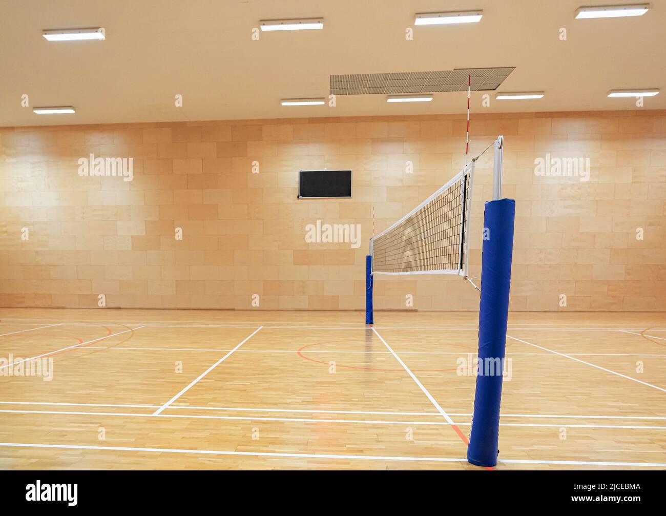 Volleyball net in the gym with the information board turned off Stock ...