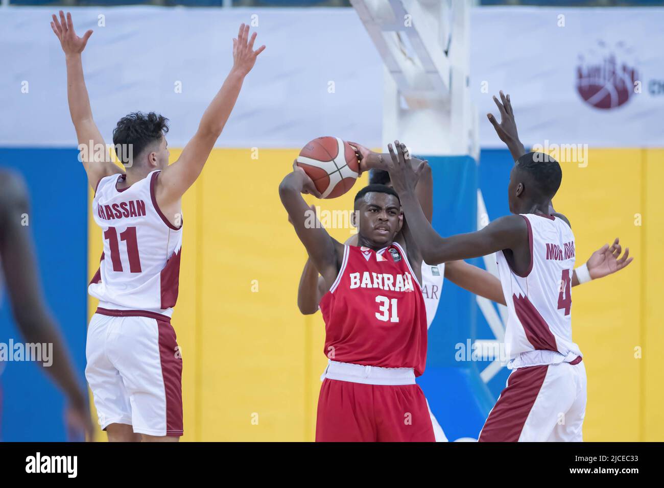 Doha, Qatar. 12th June, 2022. Mohamed Sami Salem Ateeq Salem (C), Ghassan Hajar (L) and Mohamed ...
