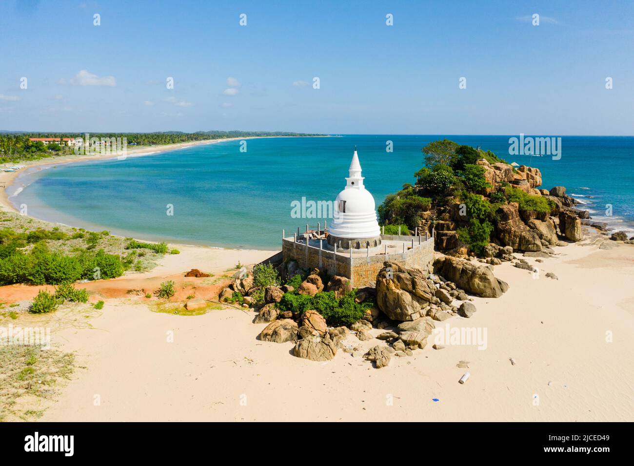 Aerial view of Buddhist monastery, stupa on the beach near the ocean ...