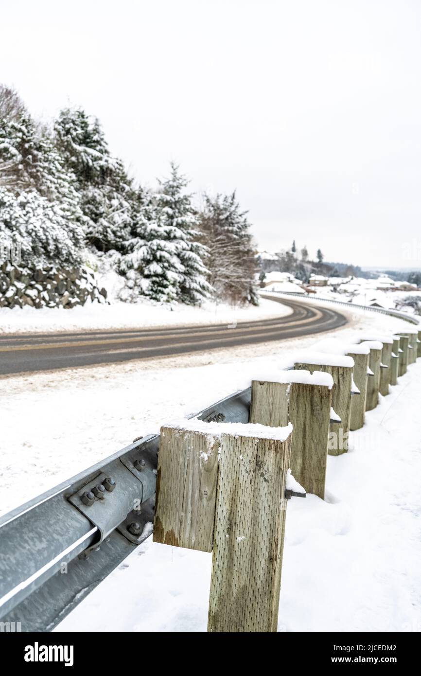 Guard rail snow on guard rail highway hi-res stock photography and ...