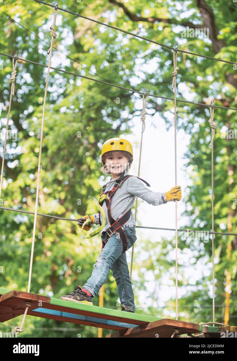 Toddler kindergarten. Active children. Balance beam and rope bridges ...