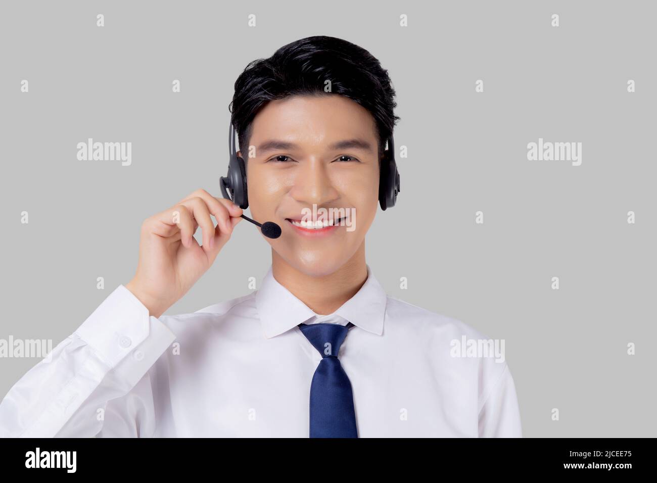 Portrait young asian business man call center wearing headset isolated ...