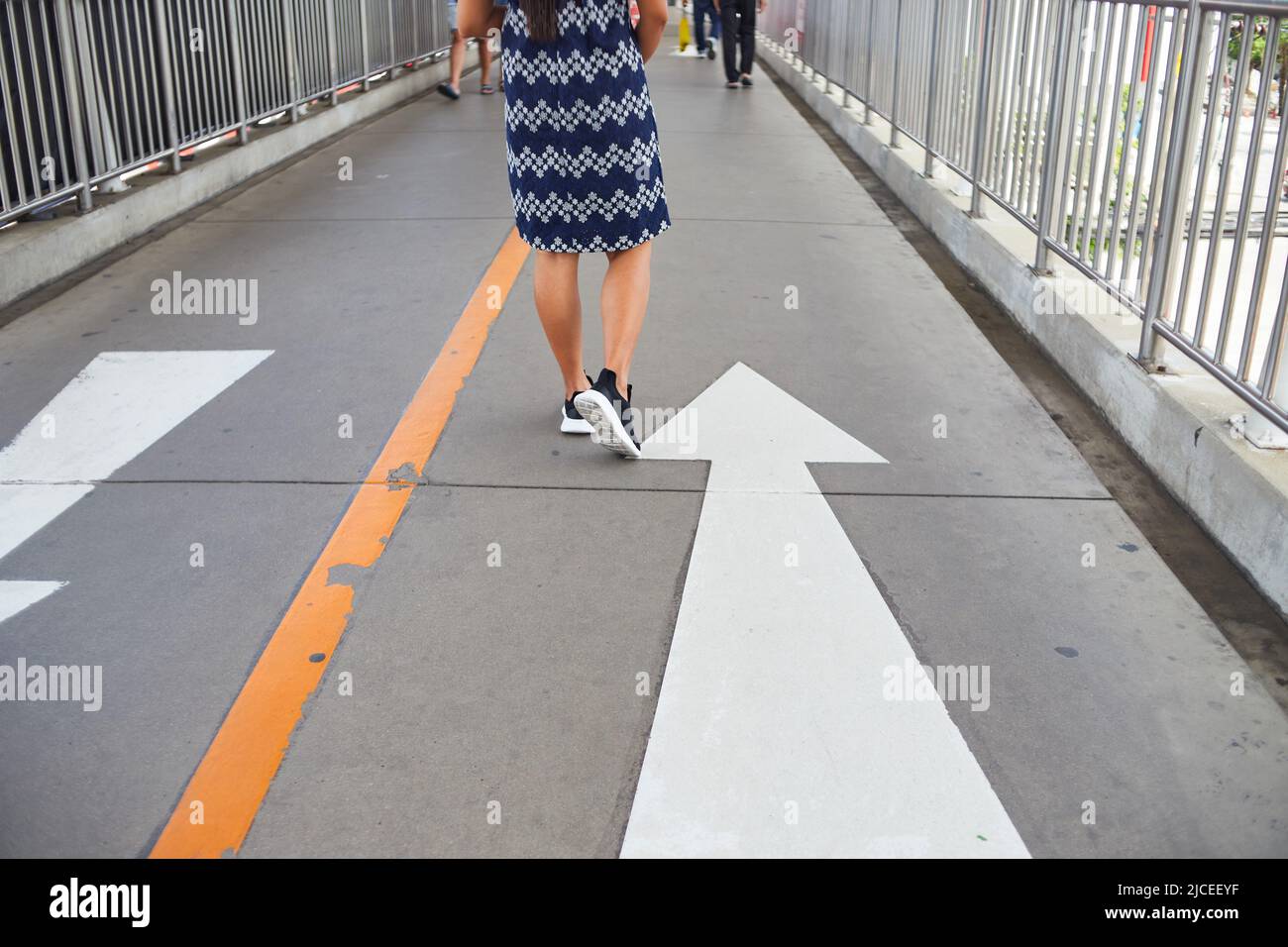 Pedestrian directional arrow hi-res stock photography and images - Alamy