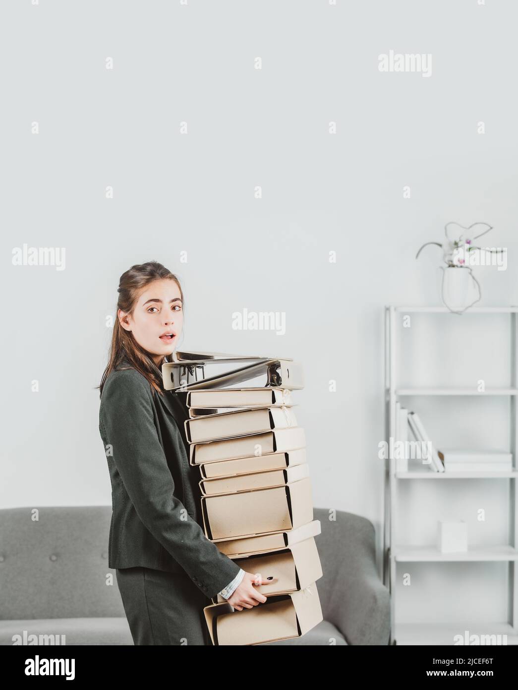 Sad busy secretary, stressed overworked business woman too much work ...