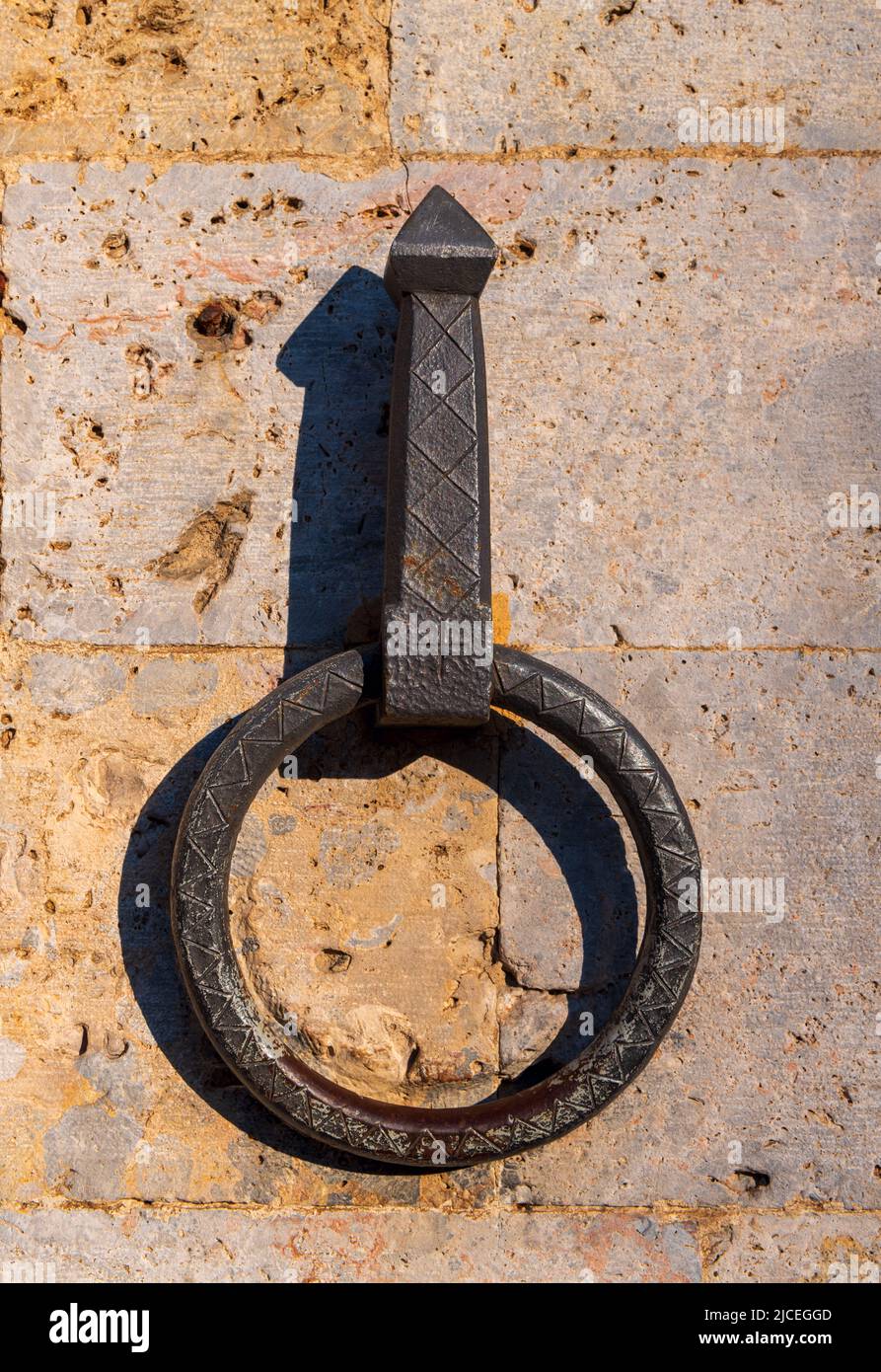 Horse tying ring on a stone wall Stock Photo - Alamy