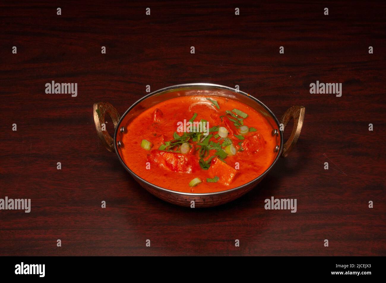 Authentic and traditional Indian cuisine dish known as butter chicken ...