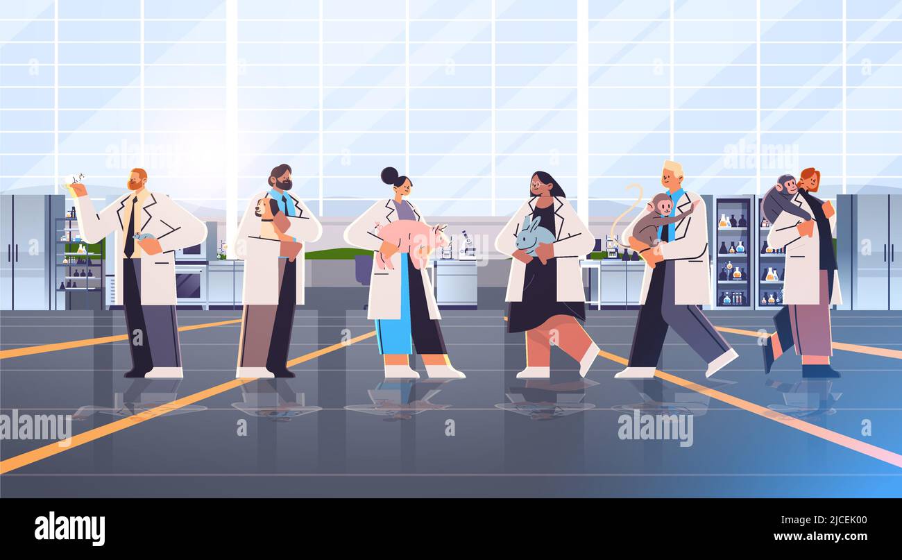 scientists or veterinary workers doing experiments in lab with ...