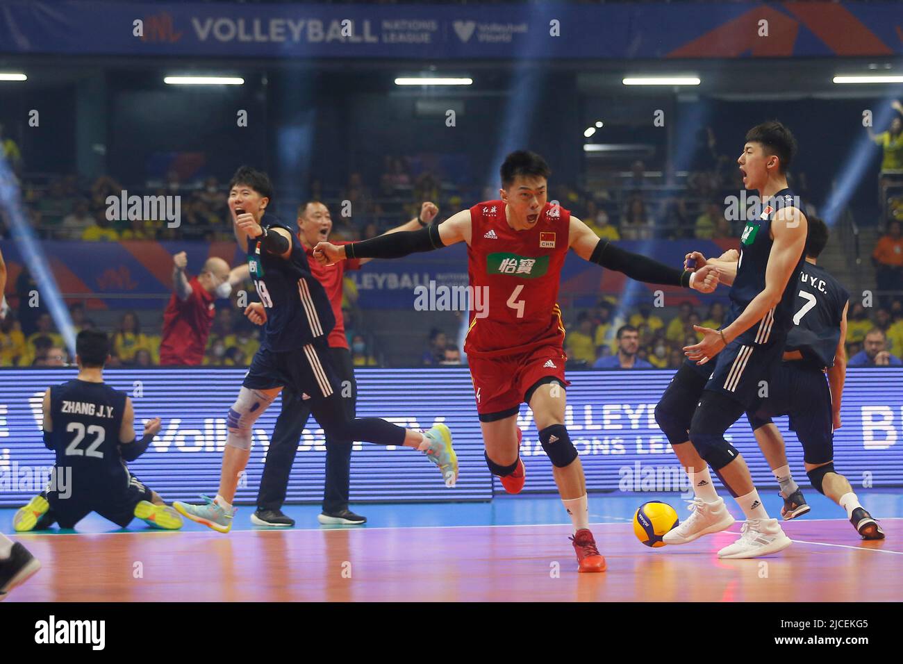 Brasilia, Brazil. 12th June, 2022. China's Yang Yiming (C) celebrates ...