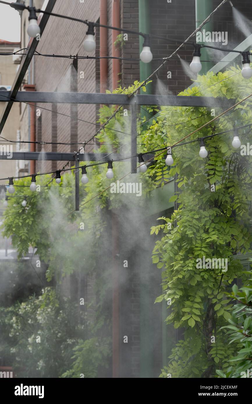 Water spray system to create a humidifier and cooling climate to reduce ...