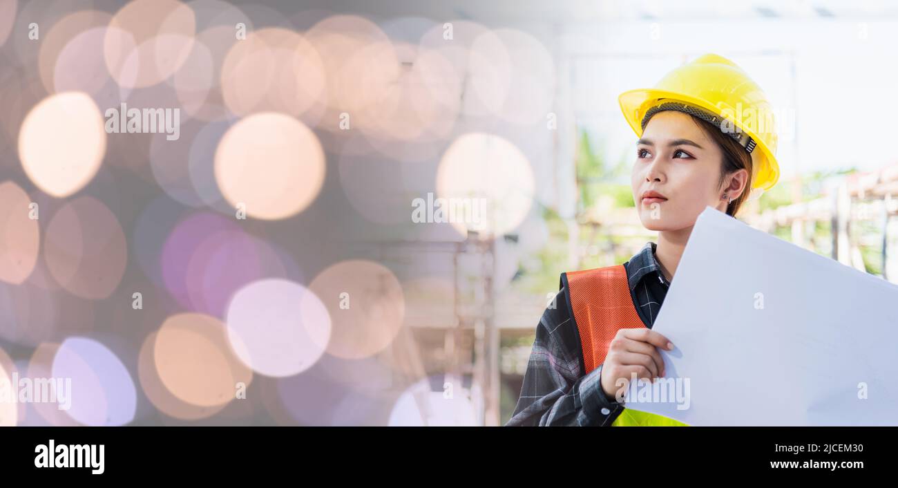 Women engineer hold blueprint hi-res stock photography and images - Alamy