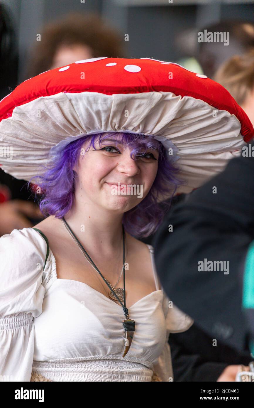 A cosplayer dressed as Toad from the Nintendo franchise Super Mario at ...
