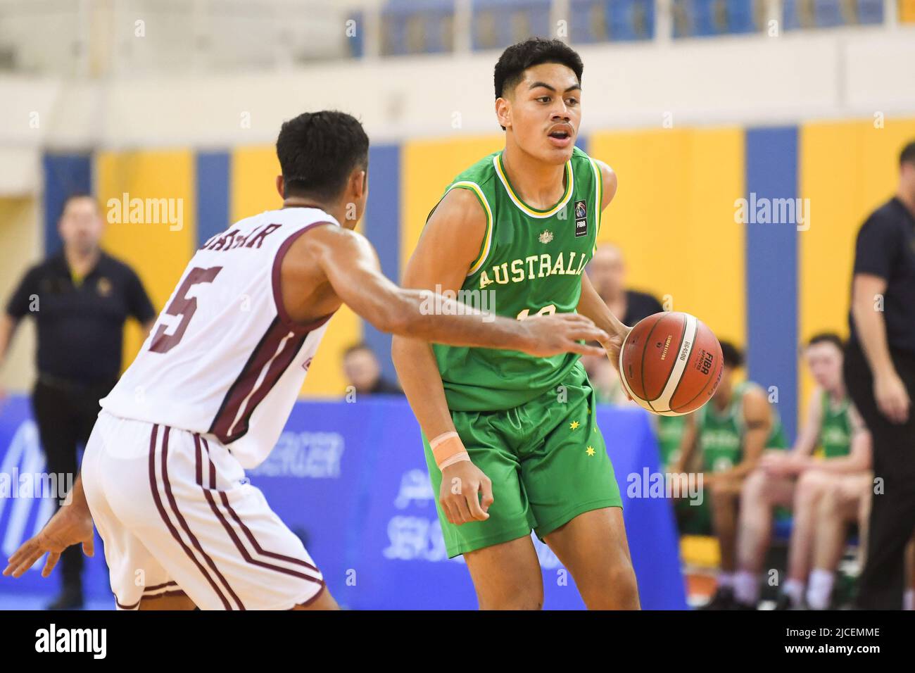 Doha, Qatar. 12th June, 2022. Roman Siulepa (R) of Australia Basketball ...