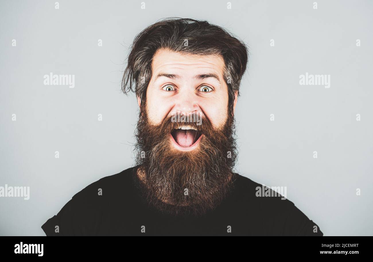 Happy man smile face. Handsome smiling young guy with long beard and ...