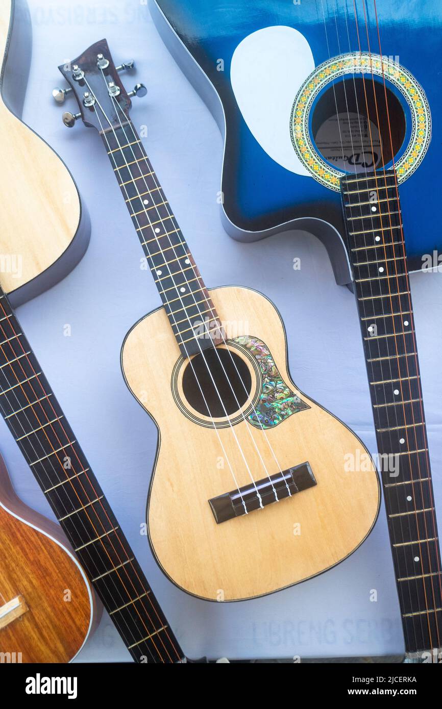 Cebu made guitars of different colors and sizes at a stall in Lapulapu ...