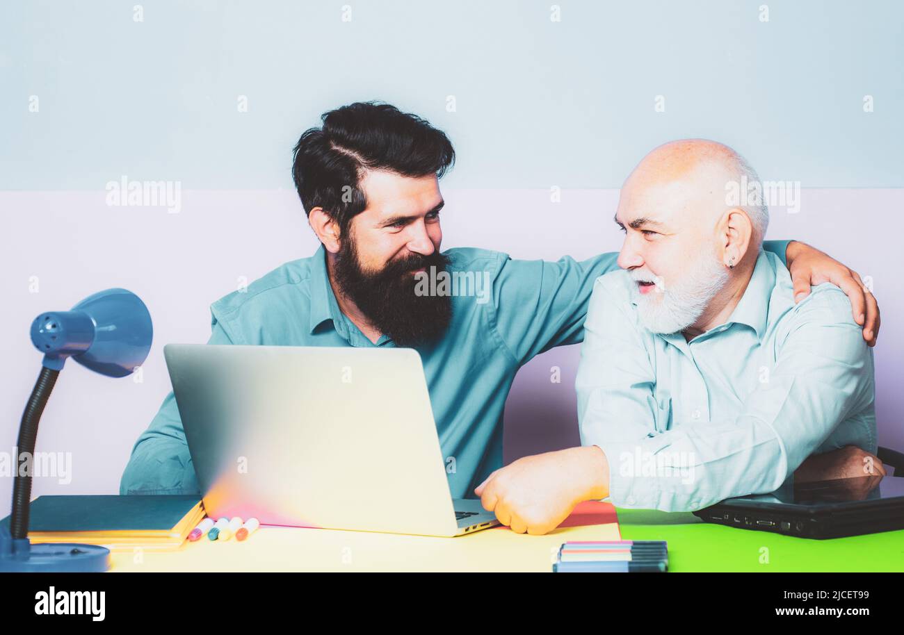 Business people having meeting around table in modern color office ...