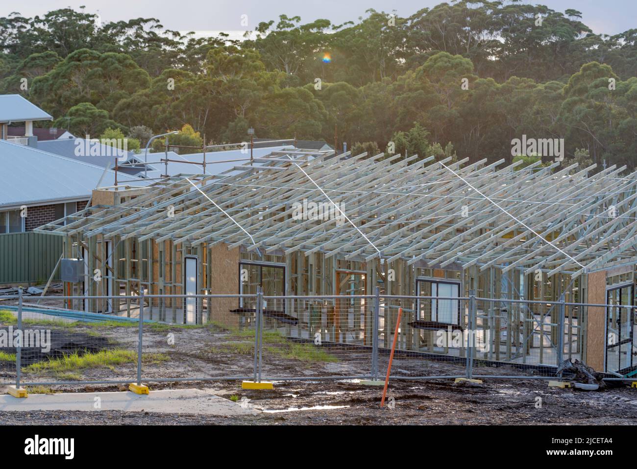 A new timber frame home or house being constructed in residential ...