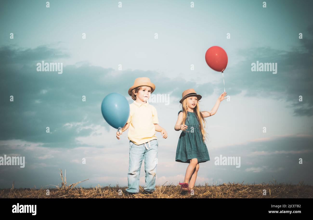 Happy smiling children on nature background. Children outdoors in ...