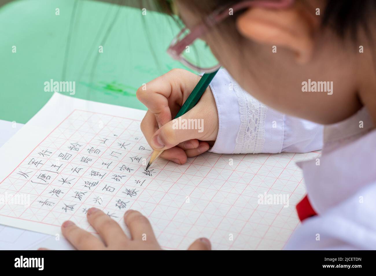 Primary students writing hi-res stock photography and images - Alamy