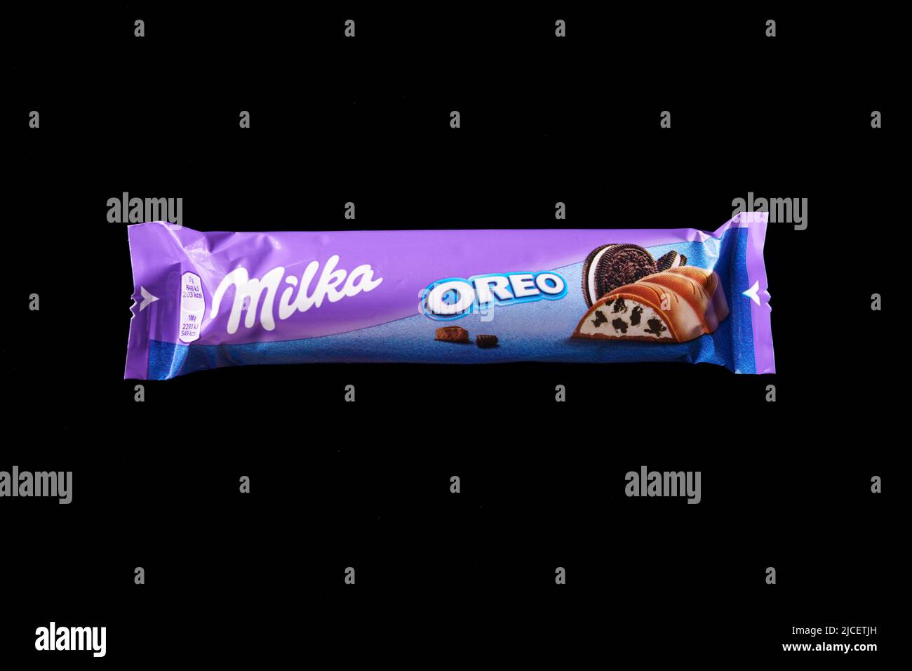 Chocolate bar Milka on a black background, top view Stock Photo - Alamy