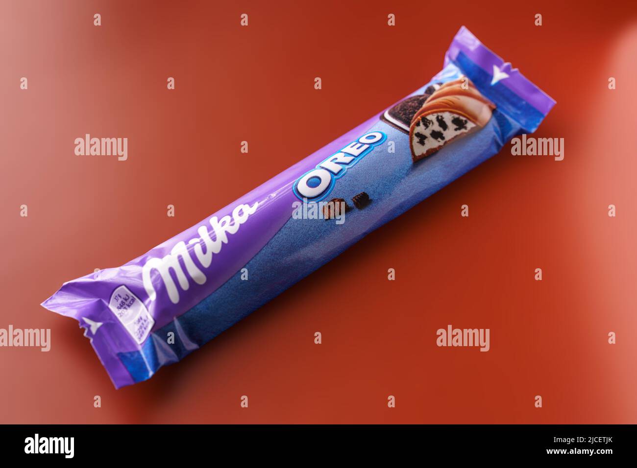 Milka chocolate bar on orange background, soft focus Stock Photo - Alamy
