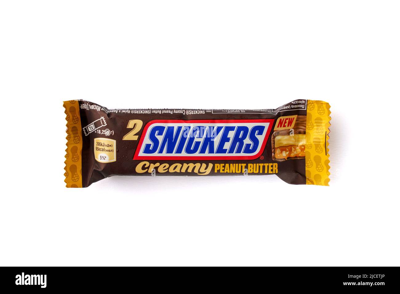 Chocolate bar Snickers on a white background, top view Stock Photo - Alamy