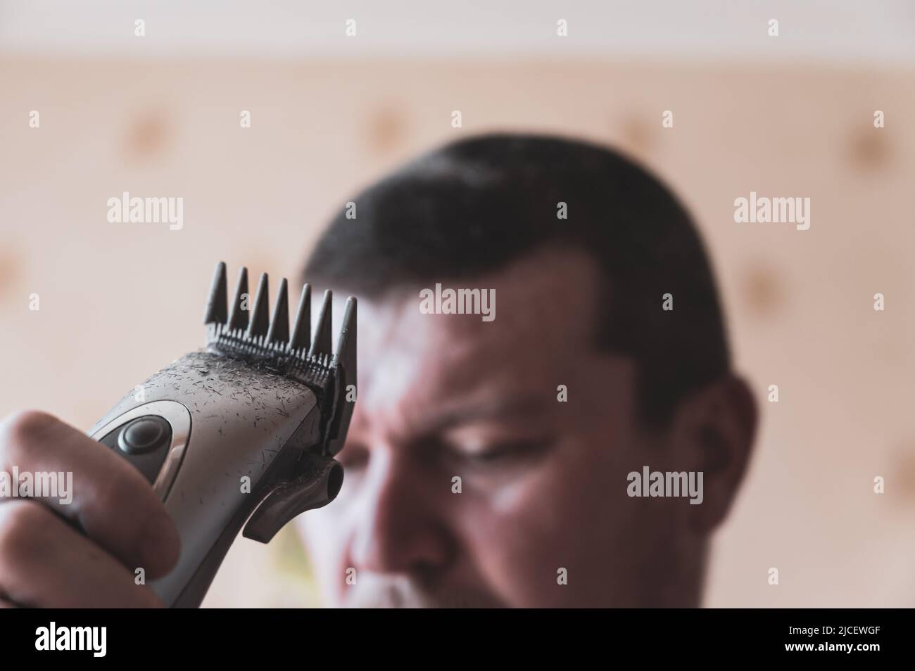 Haircutting in process hi-res stock photography and images - Alamy