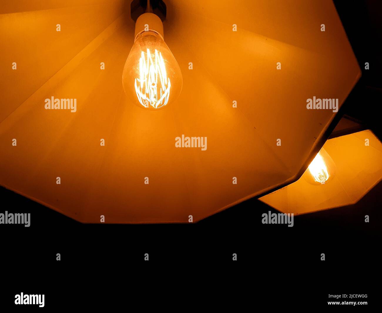 A beautiful filament lamp which adds in the accent in the room you put ...