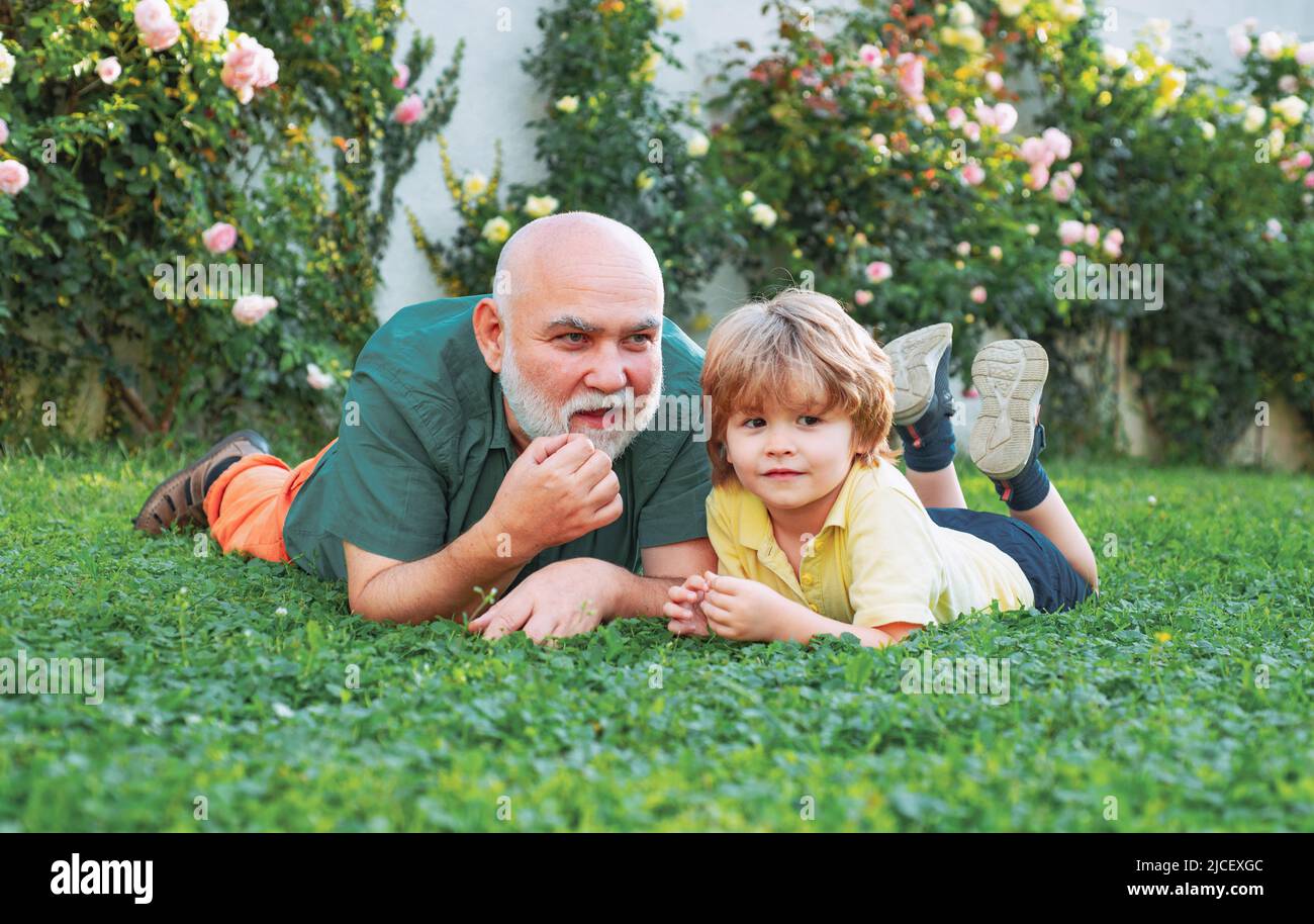 Grandfather and grandson Playing - Family Time Together. Cute boy with ...