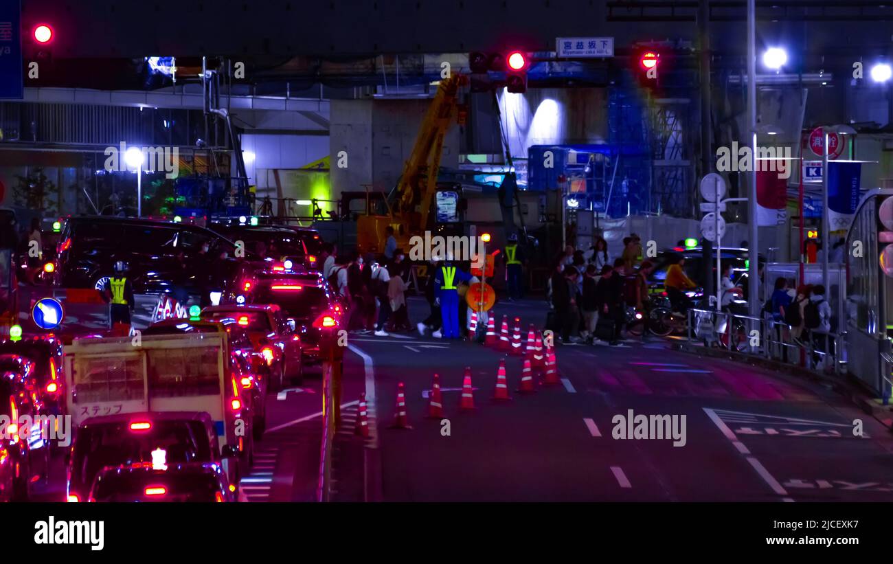 A night timelapse of the urban city street in Shibuya Tokyo long shot ...