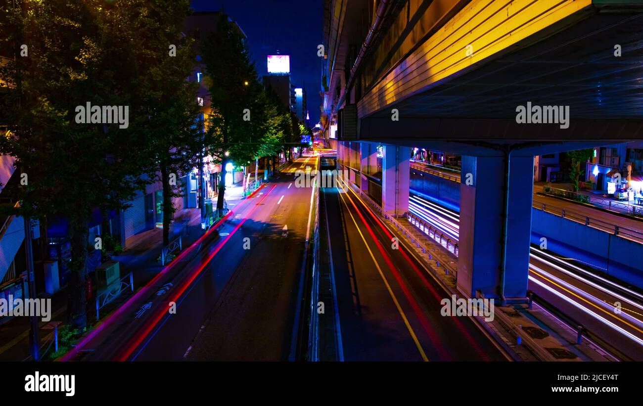 A night timelapse of the city street in Tokyo wide shot Stock Photo - Alamy