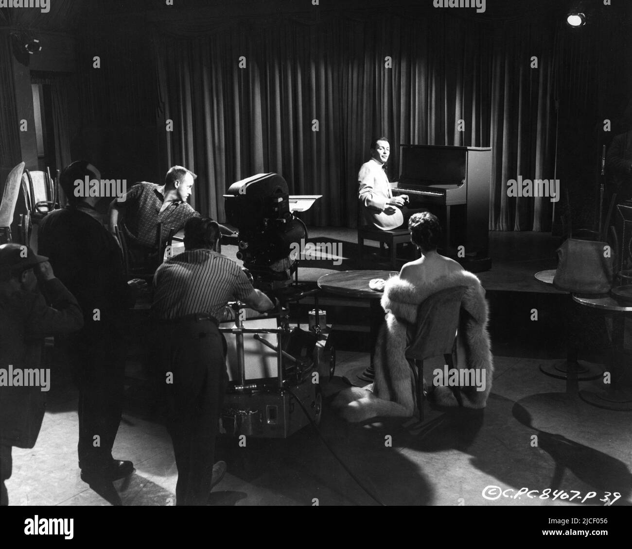 FRANK SINATRA sings The Lady is a Tramp to RITA HAYWORTH on set candid ...