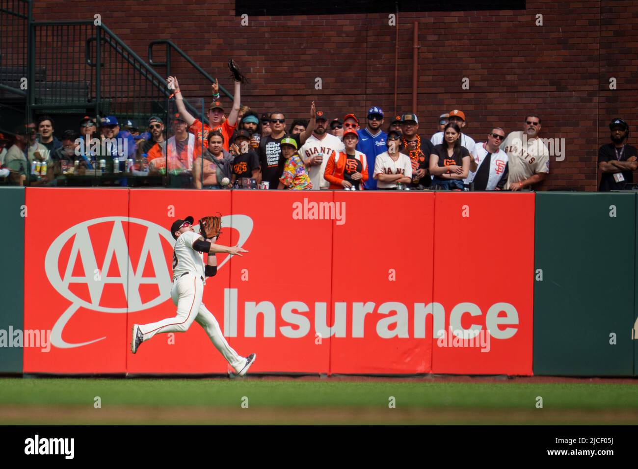 San Francisco Giants center fielder Austin Slater (13) fields a fly ...