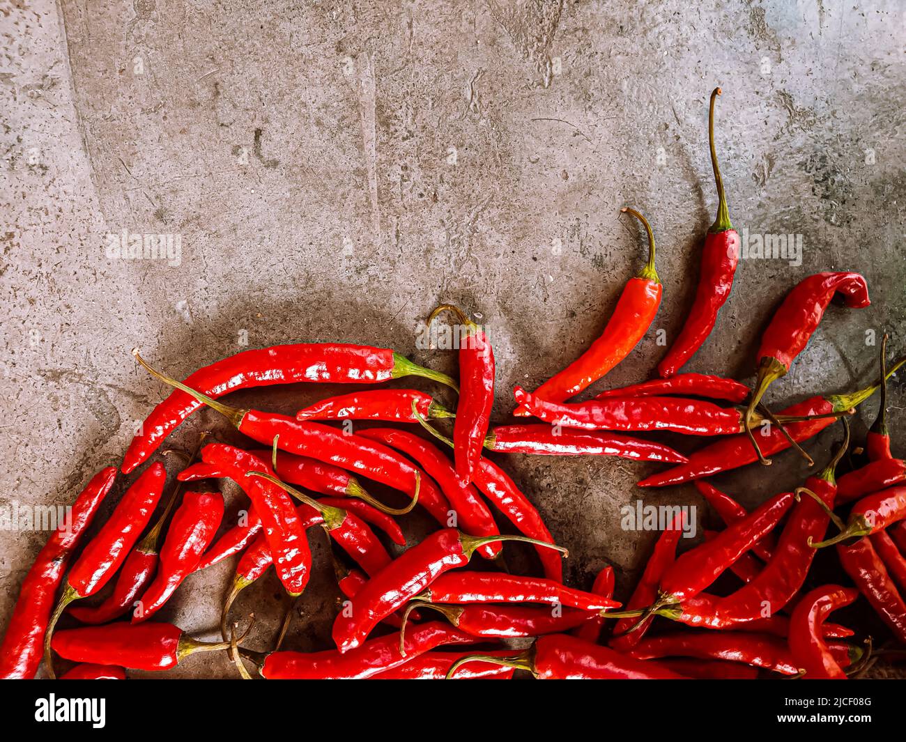 Fresh red chili peppers on vintage cloth background. fresh Red chilli ...