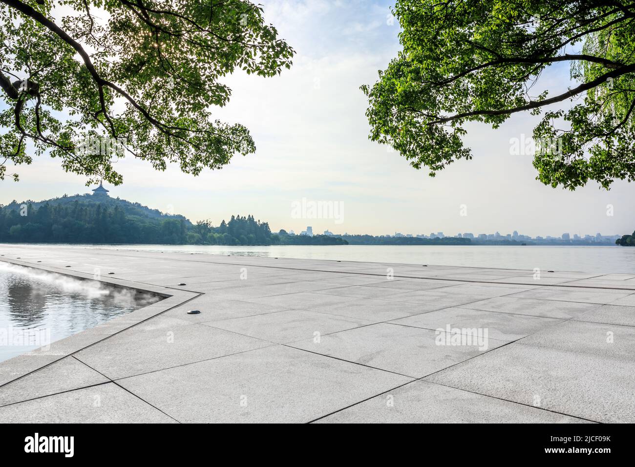 Empty square floor and West Lake with mountain natural landscape in ...