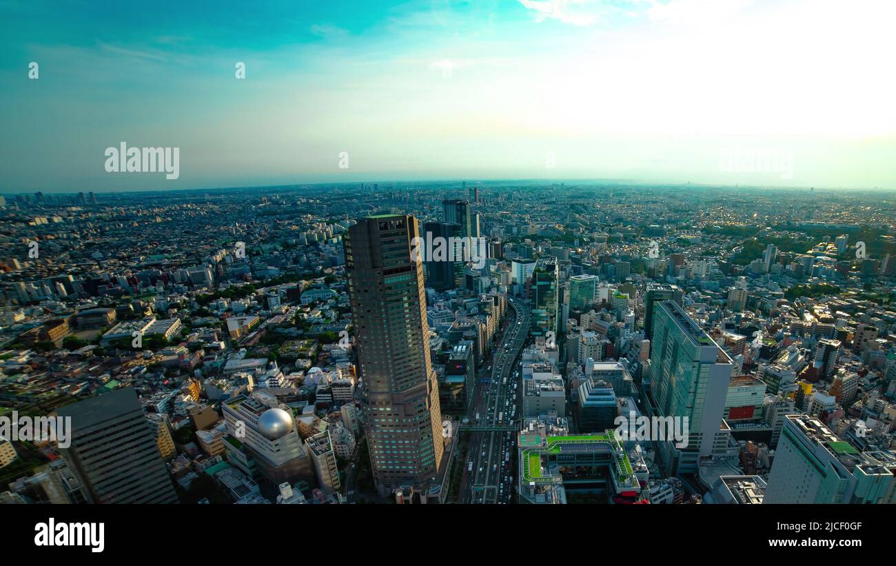 A timelapse of highway at the urban city in Tokyo wide shot panning ...
