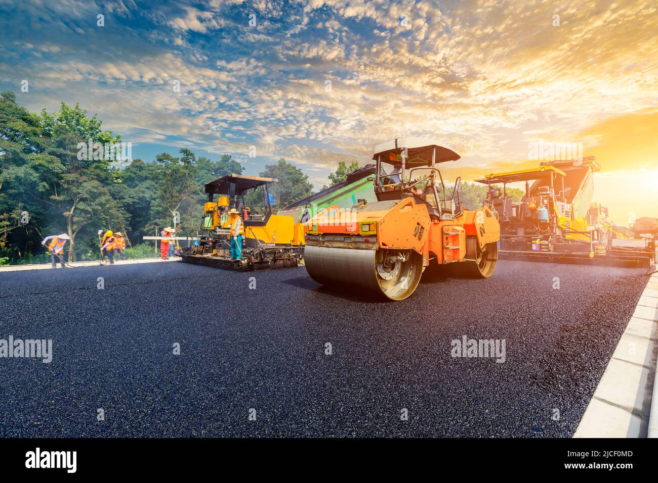Construction site is laying new asphalt pavement, road construction ...