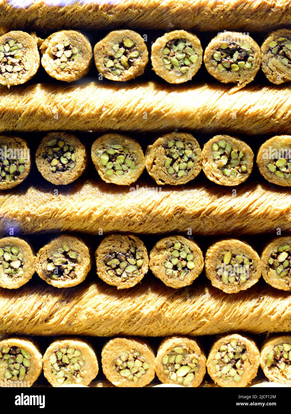 Baklava burma displayed in a Turkish pastry shop in Istanbul, Turkey ...
