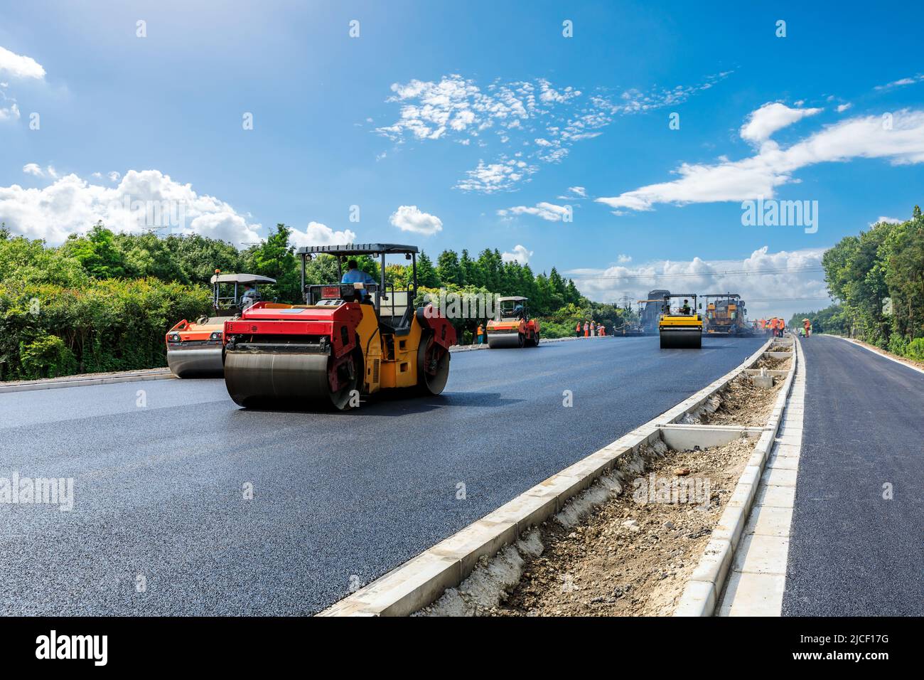 Construction site is laying new asphalt pavement, road construction ...