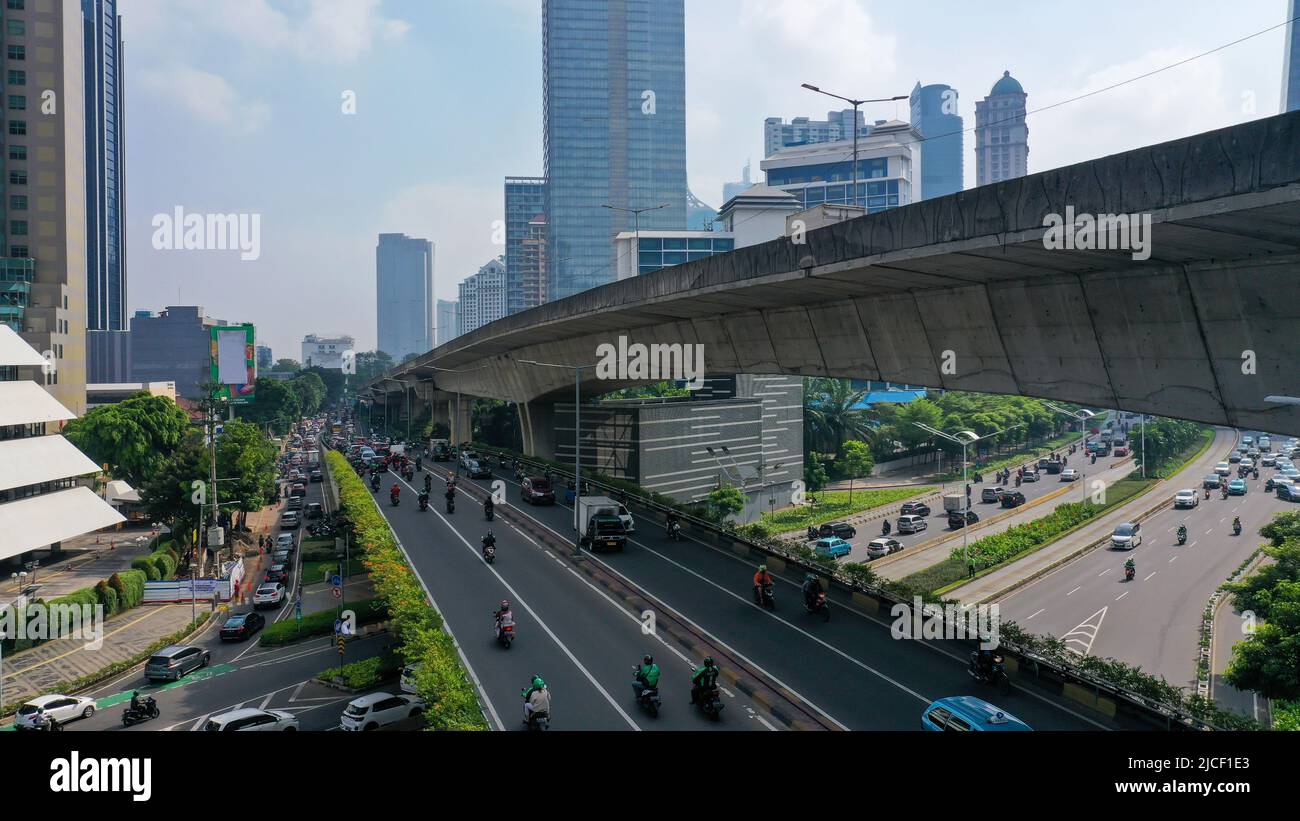 Highway multi-level interchange road with moving cars. Cars are moving ...